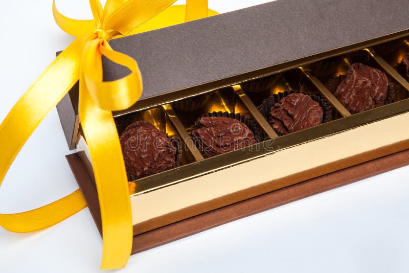 Handmade Chocolates in a Gift Box with Bow in Stock Photo - Image of ...