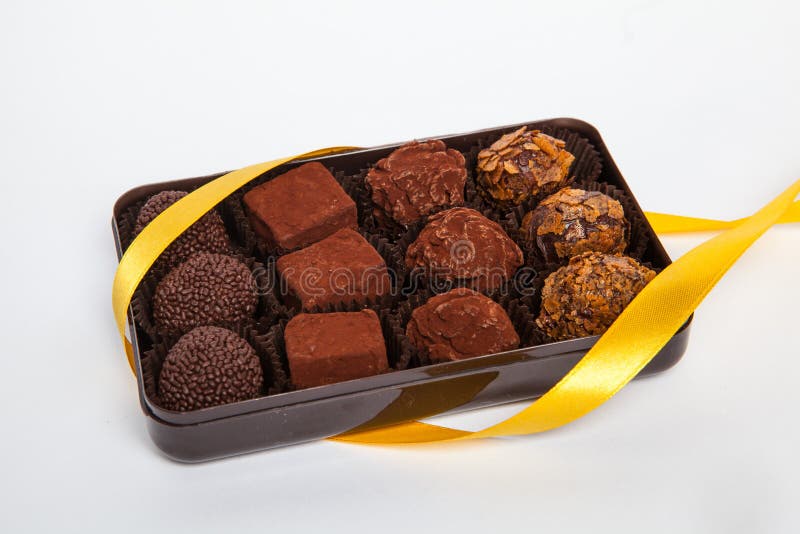 Handmade Chocolates in a Gift Box with Bow in Stock Photo - Image of ...