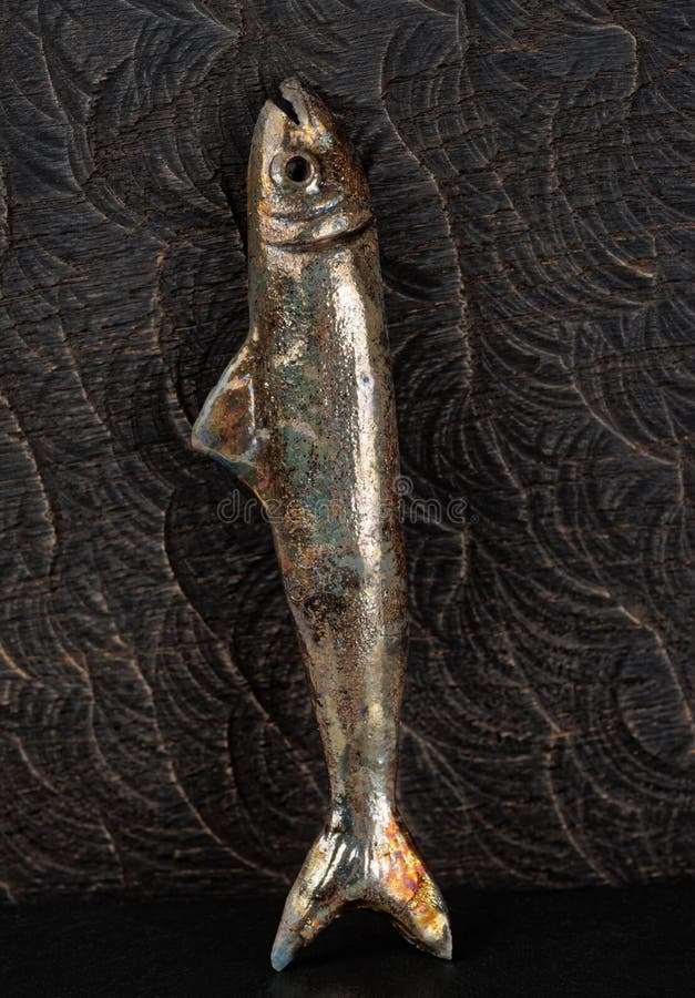 Handmade Clay Fish Against Wood Surface Stock Photo - Image of catch ...
