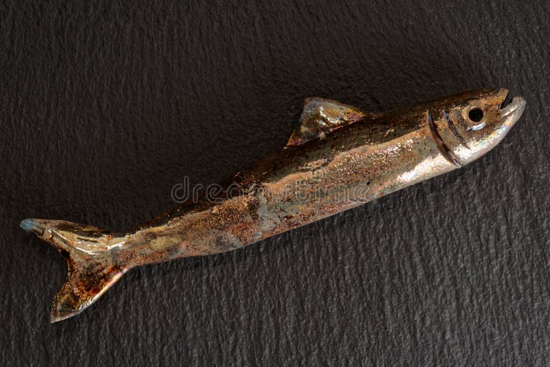Handmade Clay Fish on Slate Plate Stock Image - Image of slate, symbol ...