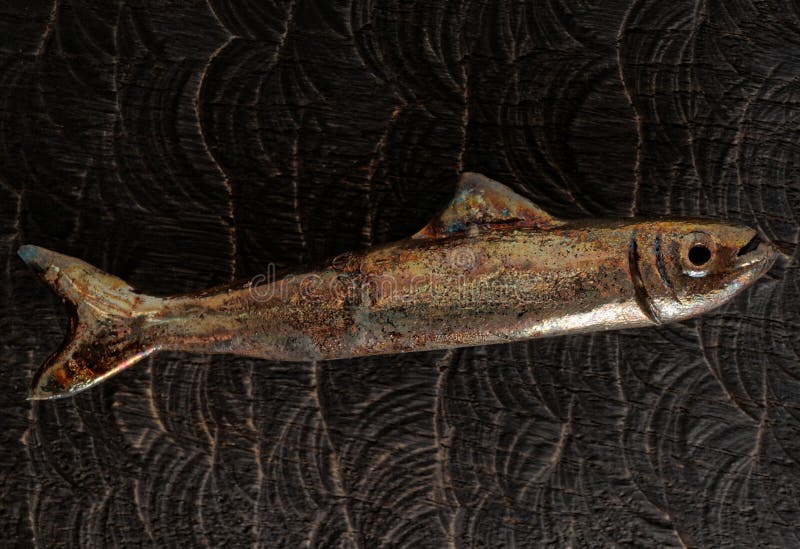 Handmade clay fish on wood stock image. Image of wood - 79339967