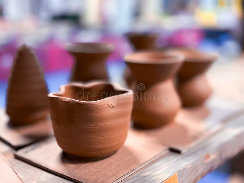 Handmade Clay Vessels on Display in Pottery Workshop Stock Photo ...