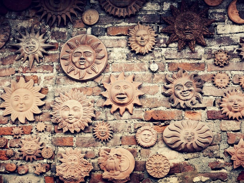 Handmade Collection of Terracotta Sun Decoration Stock Photo - Image of ...