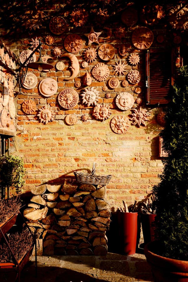 Handmade Collection of Terracotta Sun Decoration Stock Photo - Image of ...