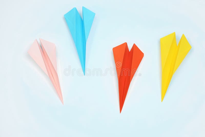 Handmade Colorful Paper Planes on White Table, Flat Lay Stock Photo ...