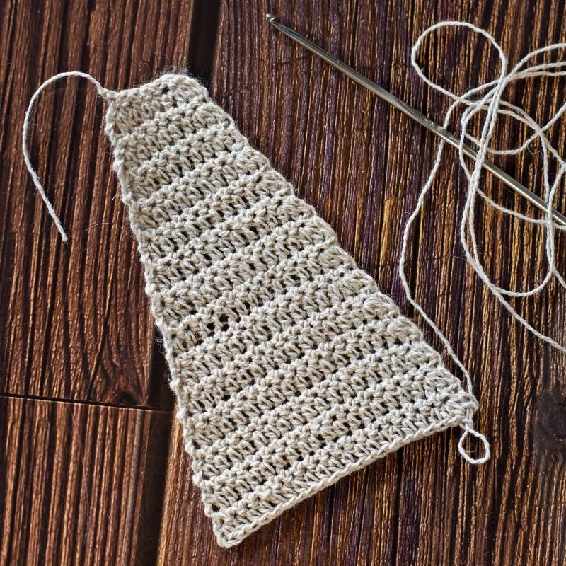 Handmade Crocheted with White Linen Threads on a Wooden Table Stock ...