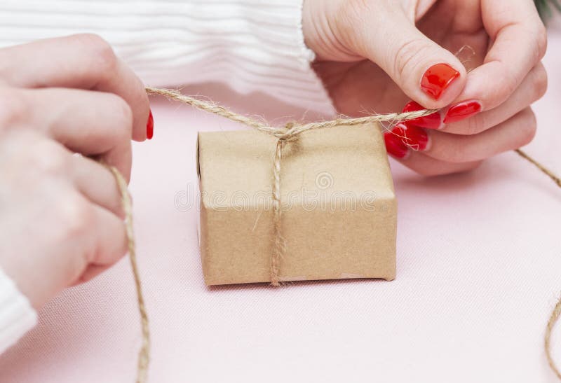 Handmade Decorations for the Holiday, Gift Wrapping, Girl Packs a Gift ...