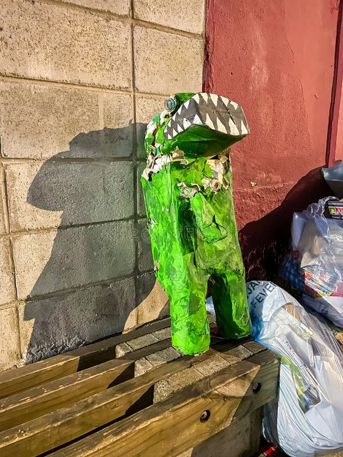 Handmade Dinosaur Sculpture on Wooden Bench Stock Image - Image of ...