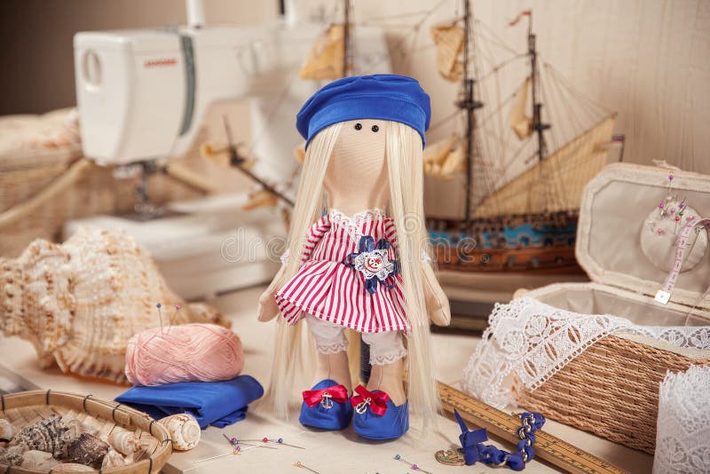 Handmade doll in workplace stock image. Image of clothing - 67544739