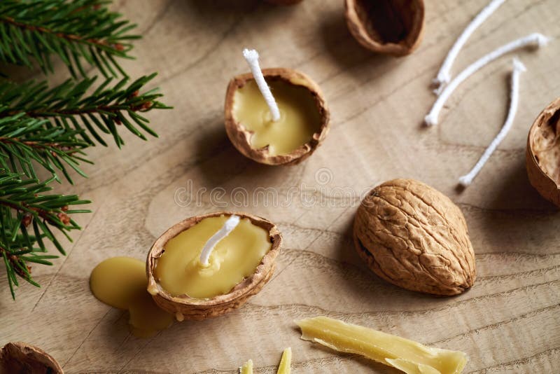 Handmade Fabrication of Christmas Candles from Melted Bees Wax and Nut ...