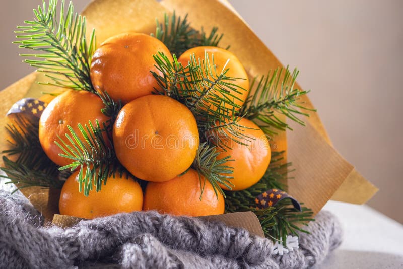 Handmade Fruit Bouquet of Mandarin and Christmas Tree Branches Stock ...