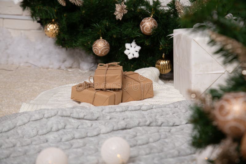 Handmade Gift Boxes on Floor Near Fir Tree Stock Photo - Image of event ...