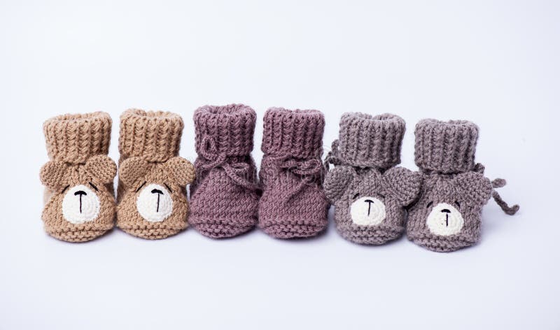 Handmade Knitted Baby Booties on Light Background. Stock Image - Image ...