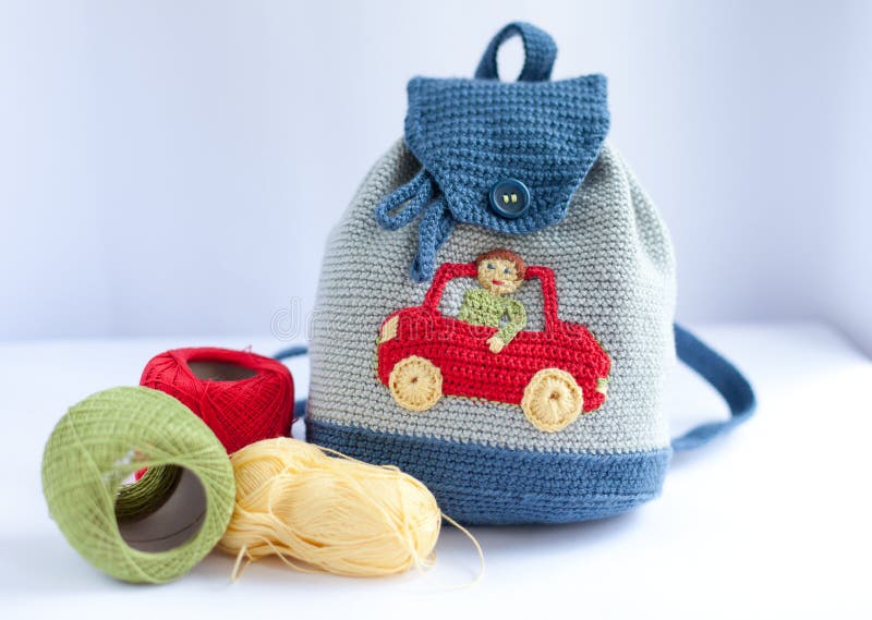 Handmade Knitted Backpack and Colorful Tangles of Yarn Stock Photo ...