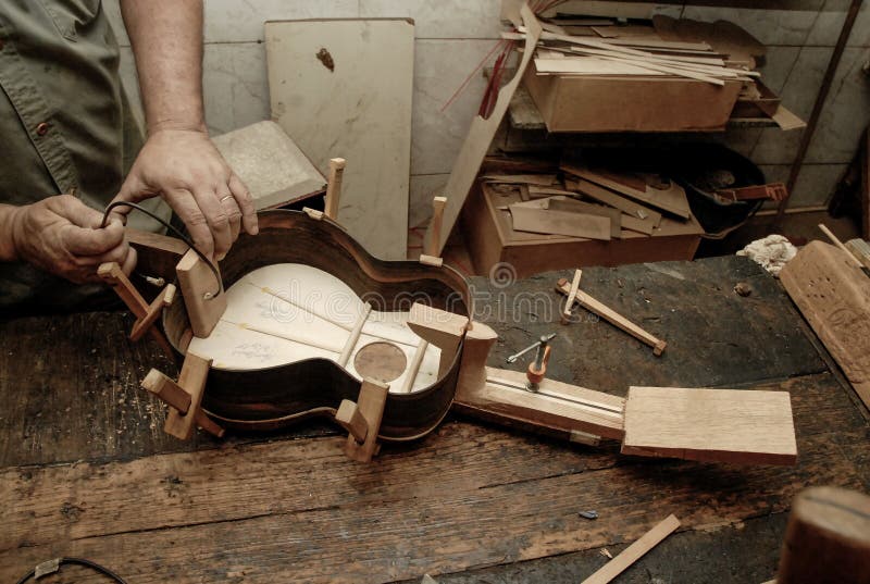 The Handmade of a Luthier of Stringed Musical Instruments. Stock Photo ...