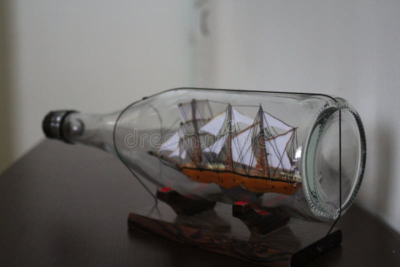 MINIATURE SHIP in a BOTTLE stock image. Image of design - 269124229