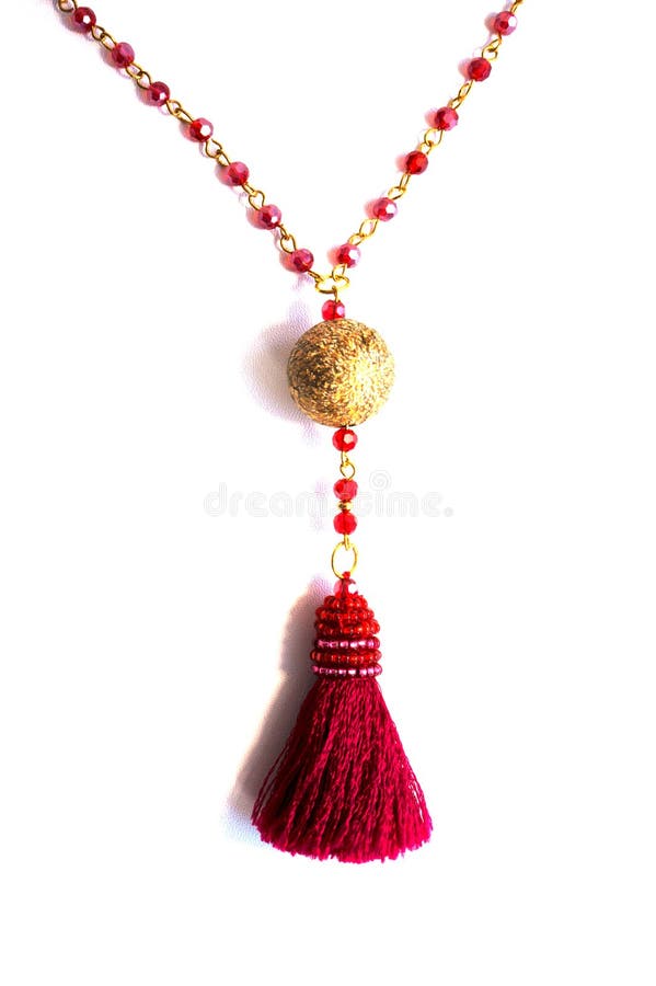 Handmade Necklace of Red Color with a Gold Bead and a Brush Stock Image ...