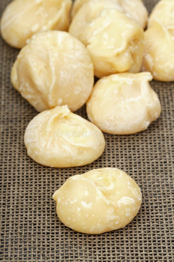 Handmade Organic Coconut Palm Sugar on Black Plate Stock Image - Image ...