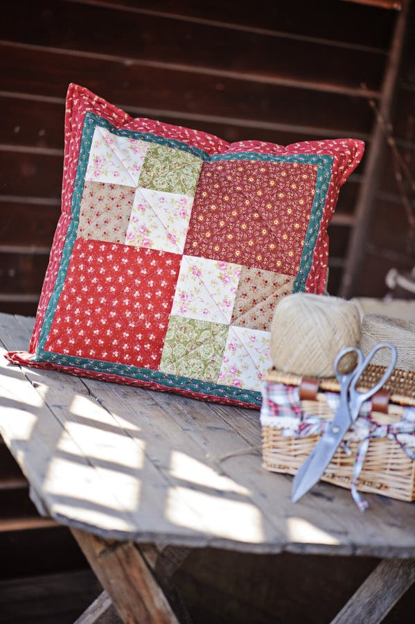 Handmade Patchwork Cushion with Sewing Tools on Wooden Table Stock ...