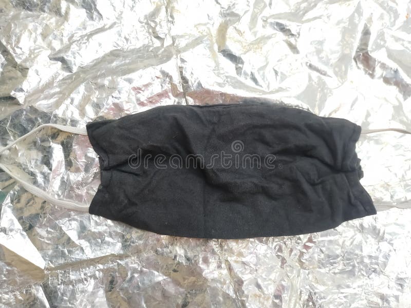 Handmade Protective Mask and Piece of Cloth on White Background. Stock ...