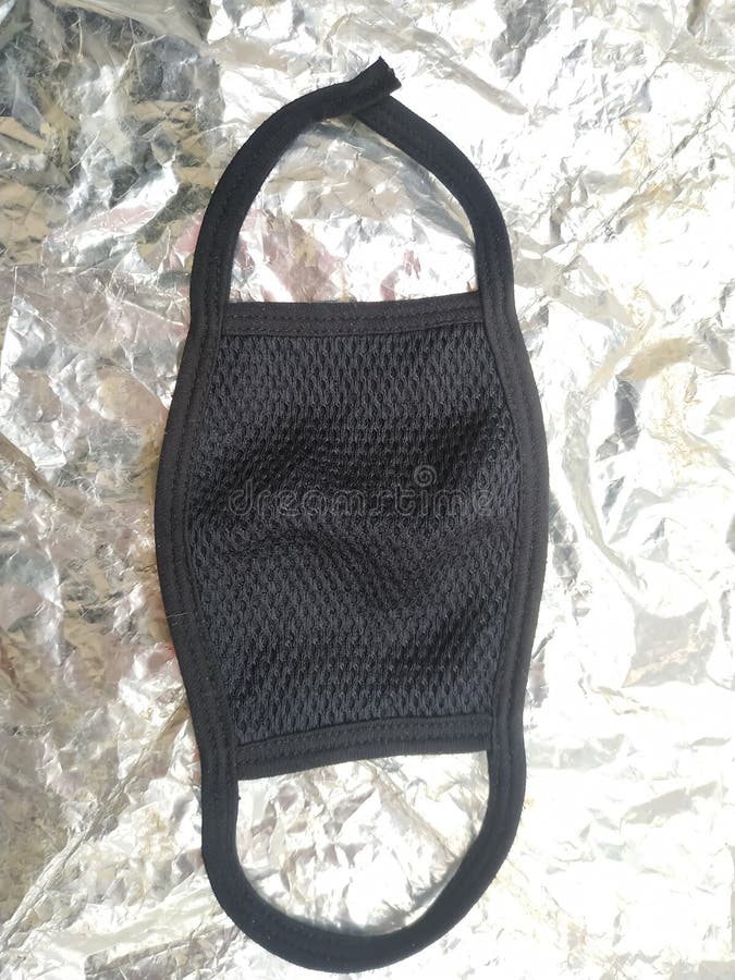 Handmade Protective Mask and Piece of Cloth on White Background. Stock ...