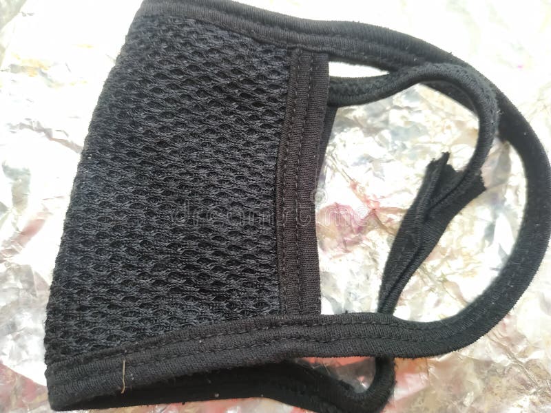 Handmade Protective Mask and Piece of Cloth on White Background. Stock ...