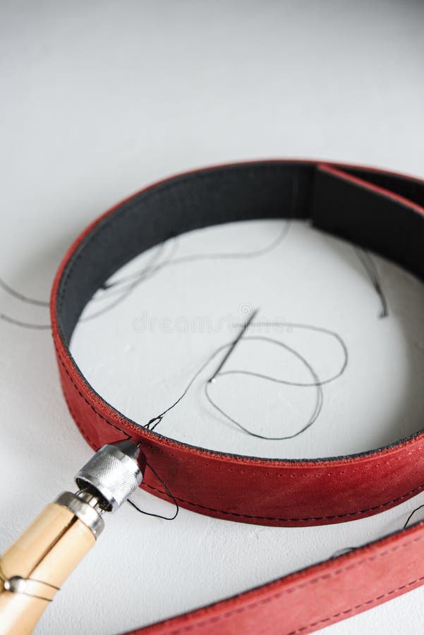Handmade Red Leather Belt Sewing with Awl at Table Stock Image - Image ...