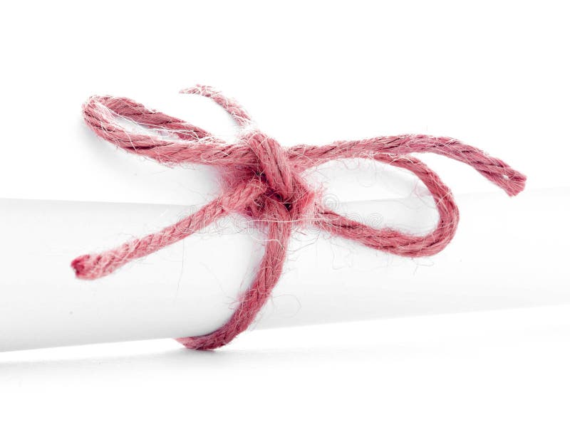 Handmade Red String Knot Tied on White Paper Roll Isolated Stock Photo ...