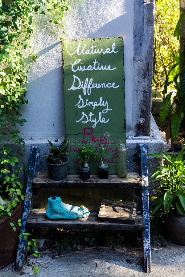 Green Signs Hanging on the Wall Stock Image - Image of wall, hanging ...