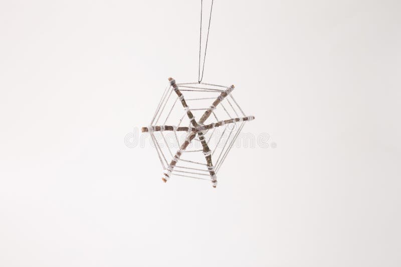 A Handmade a Spider Web Craft Created Using Six Small Sticks Arranged ...