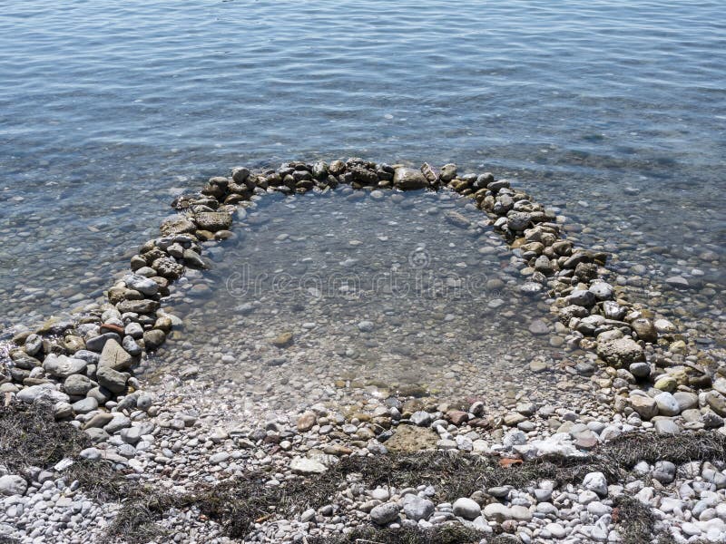 Handmade Stone Pool for Kids with Eater on Seaside Stock Photo - Image ...