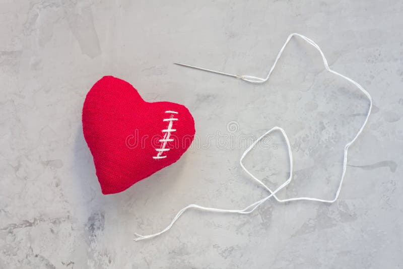 Handmade Textile Heart Was Broken and Sewed Again with White Thread on ...