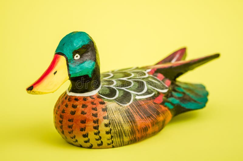 Handmade Wooden Ducks for Home Decoration on Yellow Background Stock ...