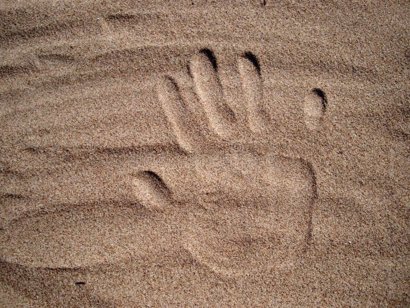Handprint in sand stock image. Image of background, print - 5450765