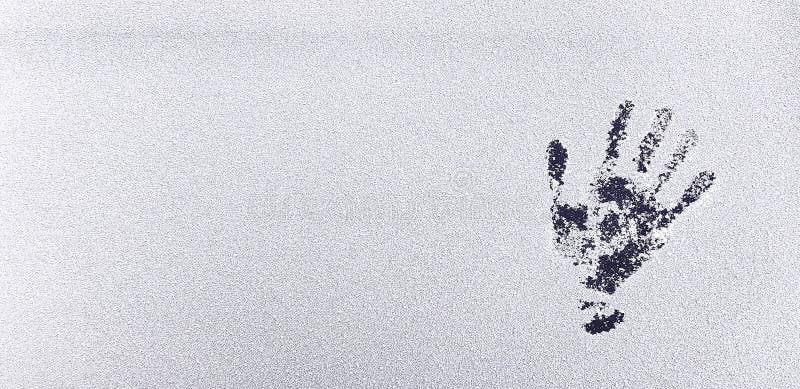 Handprint in the Snow. the Effect of Human Heat on Snow Stock Image ...