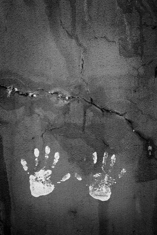 Handprints on Textured Wall Stock Photo - Image of orange, fingers ...