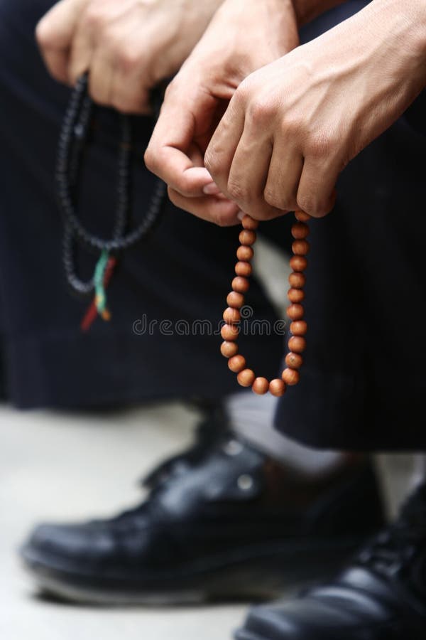 Monk with prayer beads stock photo. Image of lhasa, religion - 23423292