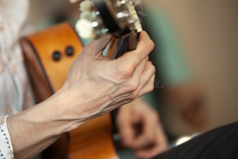 Hands of an Acoustic Guitar Player Stock Image - Image of fingers ...