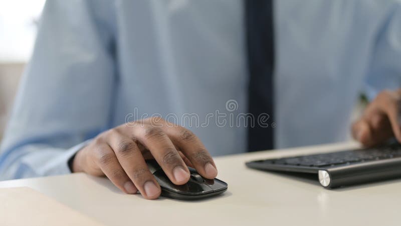 Hands of African Man Using Mouse and Keyboard, Close Up Stock Photo ...