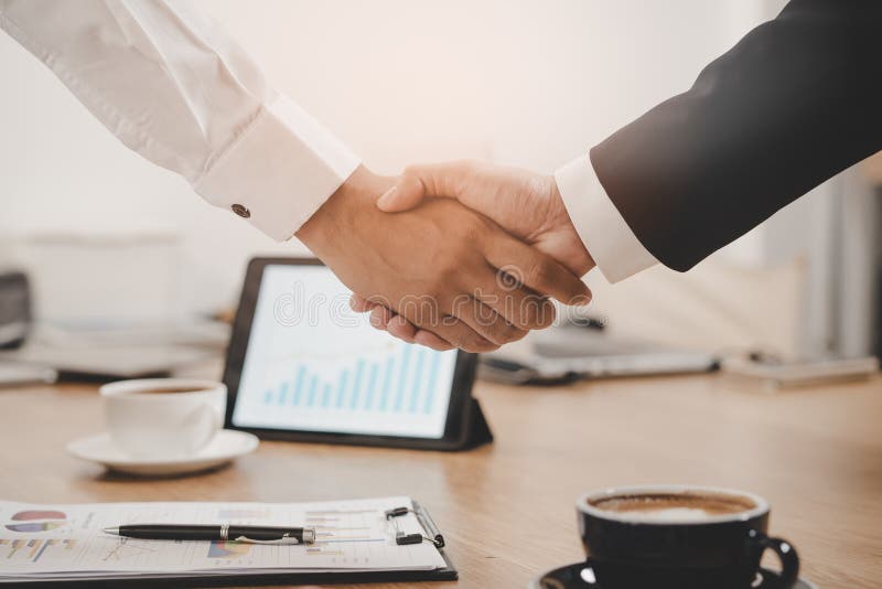 Hands of Agent and Client Shake Hands after Signed Contract Stock Image ...