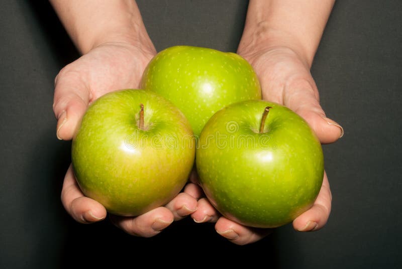 Hands with apples stock image. Image of culture, dark - 53668489