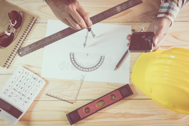 Hands of Architect Drawing Construction Plan on Wooden Desk Stock Photo ...