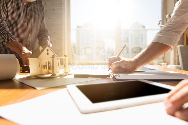 Male Architect-engineer Presents Project of Future House for Young ...