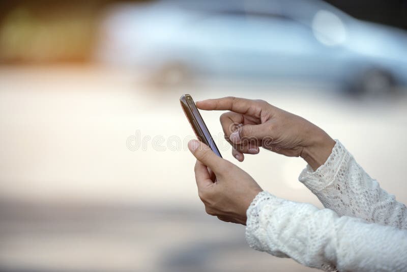 Hands of Beautiful Woman Using Smartphone Calling for Help with Car ...