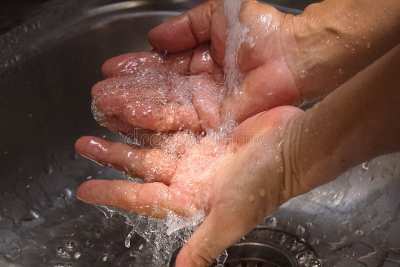 Hands Being Washed Scrubbed and Rinsed Using Disinfectant Soap for ...