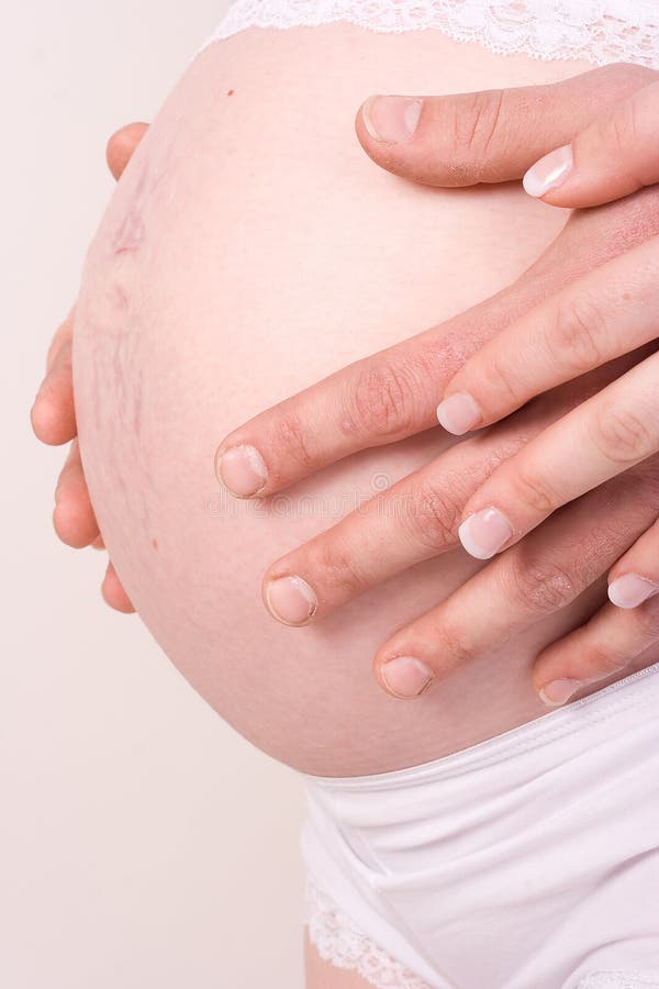 Hands on Belly stock image. Image of pregnant, hand, mother - 4956941