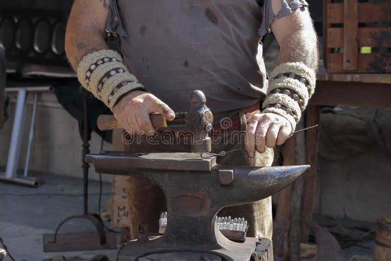 Hands of blacksmith stock image. Image of anvil, male - 81503567