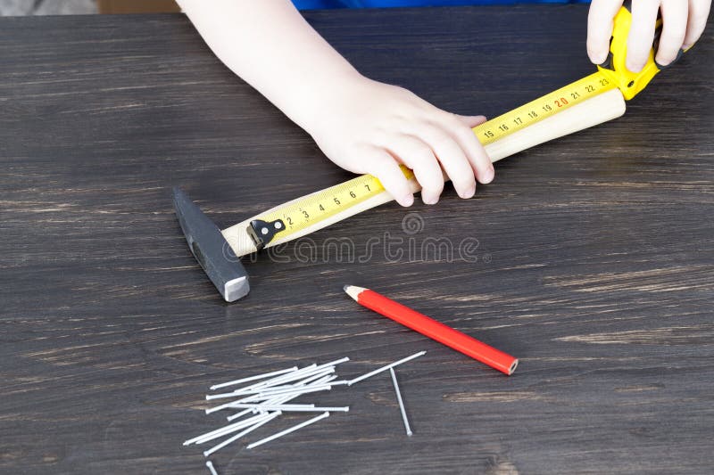 Ruler in the hands stock photo. Image of object, instrument - 20714334