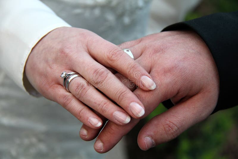 Hands of Bridal Couple with Wedding Rings Stock Photo - Image of bridal ...