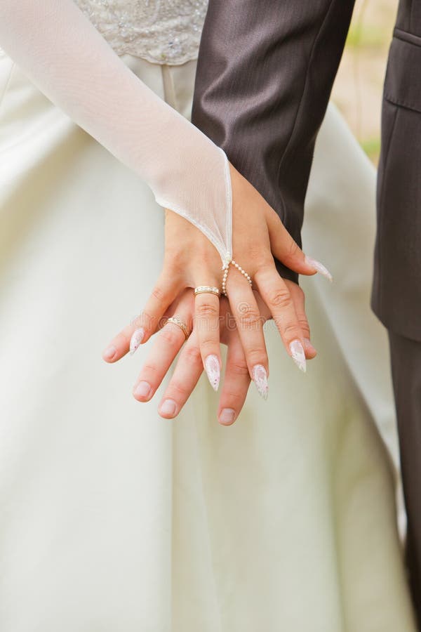 Hands of bride and groom. stock image. Image of people - 20315379